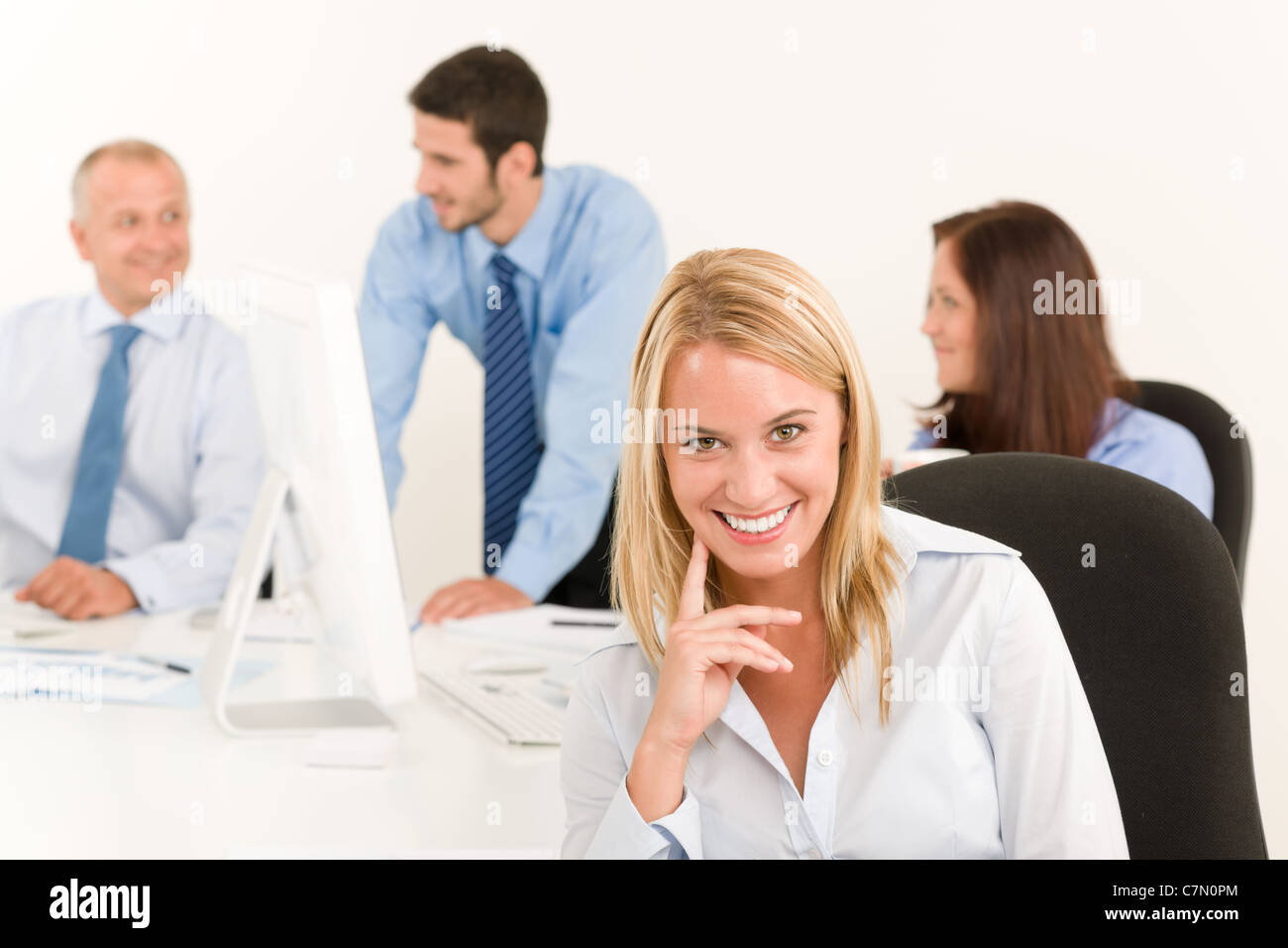 Business team pretty smiling businesswoman portrait happy colleagues ...