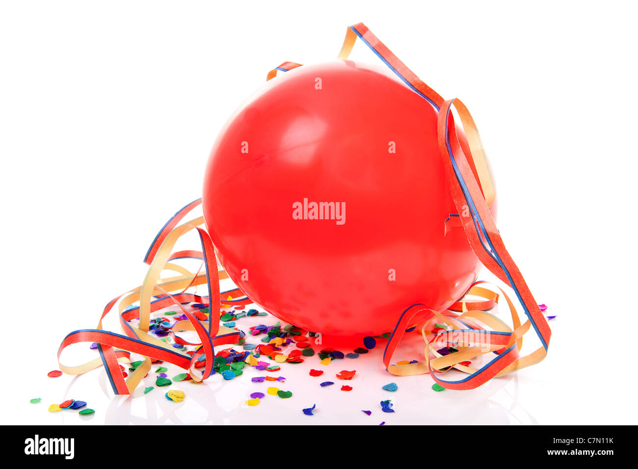 red party balloon, confetti and streamers over white background Stock ...