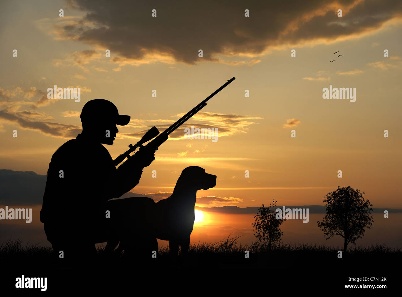 Hunter with his dog silhouettes on sunset background Stock Photo - Alamy