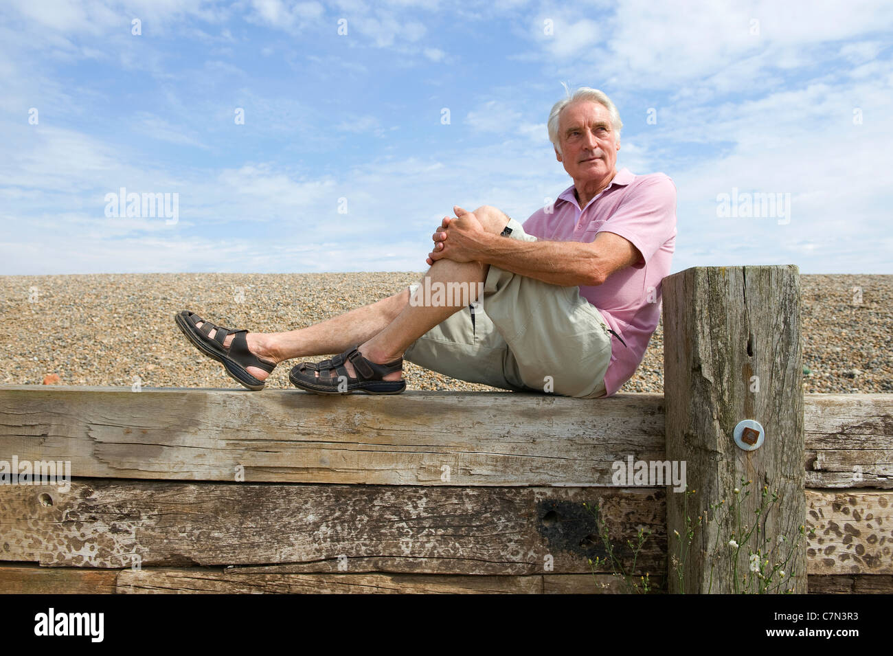 70 year old man sitting hi-res stock photography and images - Alamy