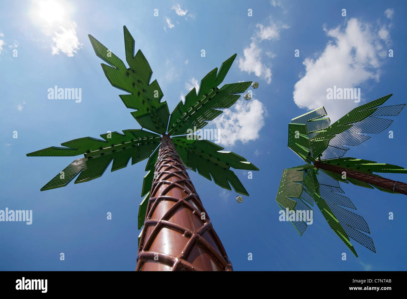 Steel palm trees in front of harbour cranes in the Antoniparkt, St ...