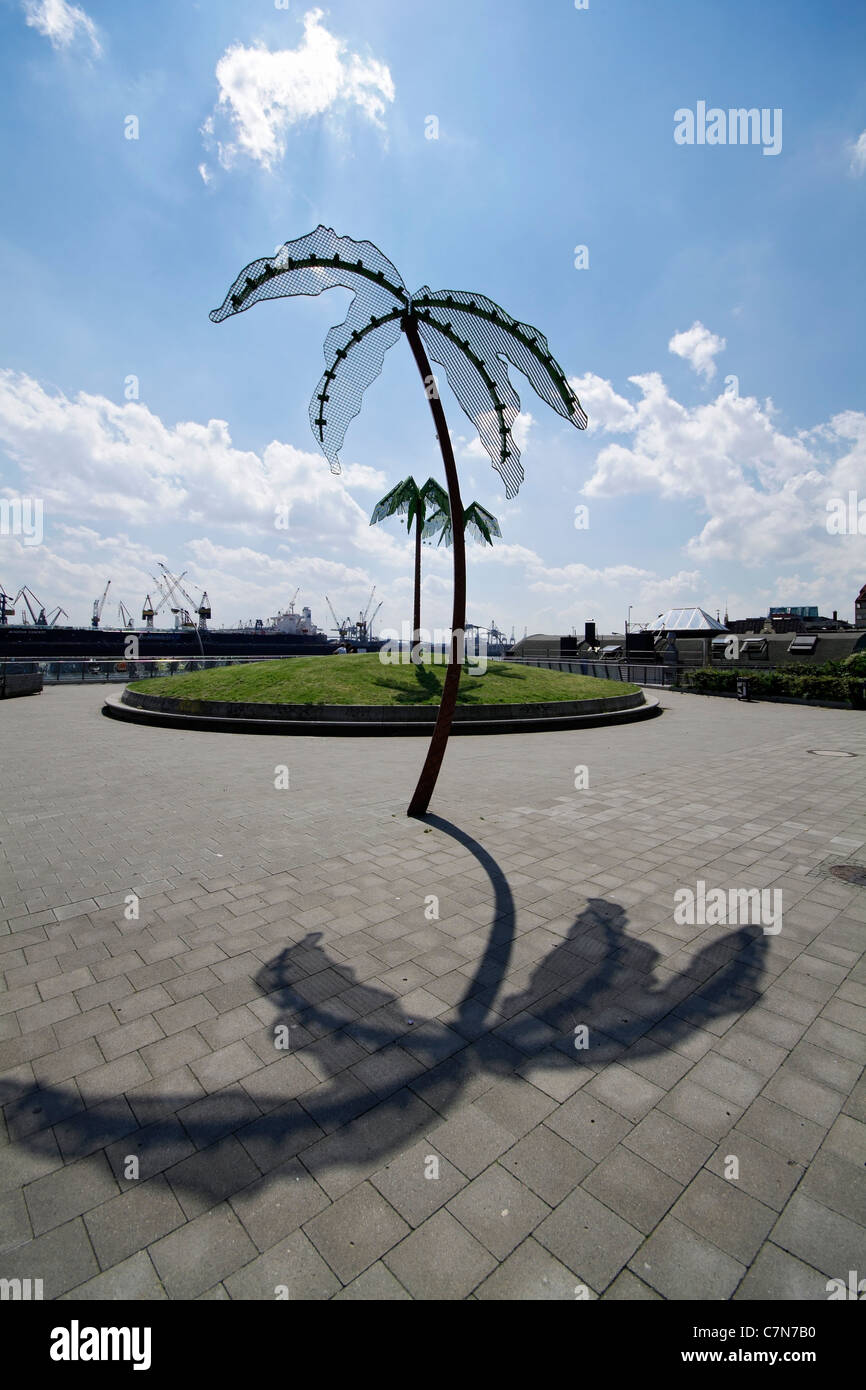 Steel palm trees in front of harbour cranes in the Antoniparkt, St ...