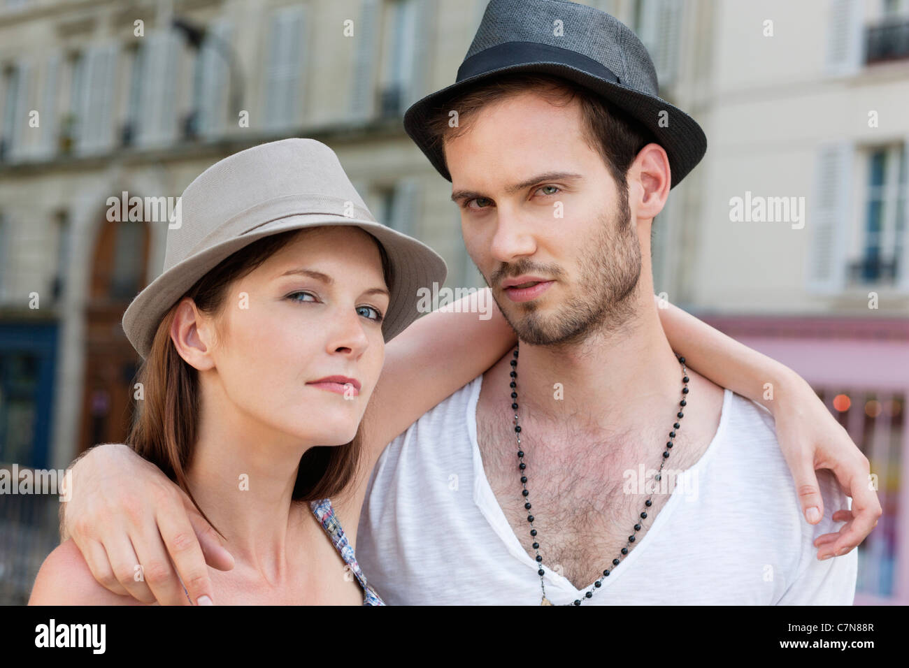 Couple with arm around each other hi-res stock photography and images ...