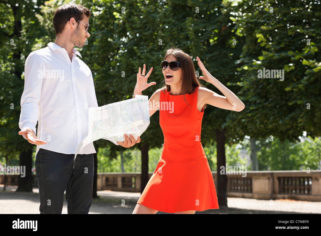 Woman shouting on a man reading a map, Terrasse De l'Orangerie, Jardin ...