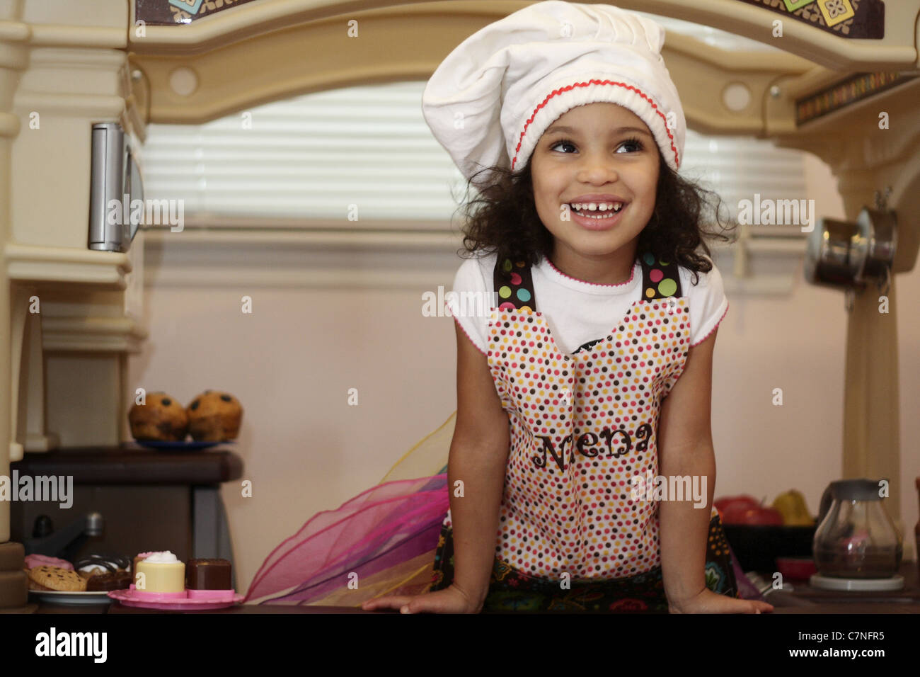 Little girl chef in her kitchen Stock Photo - Alamy