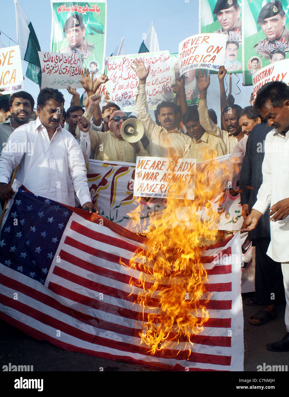 Protesters burn US flag during protest rally organized by Civil Society ...