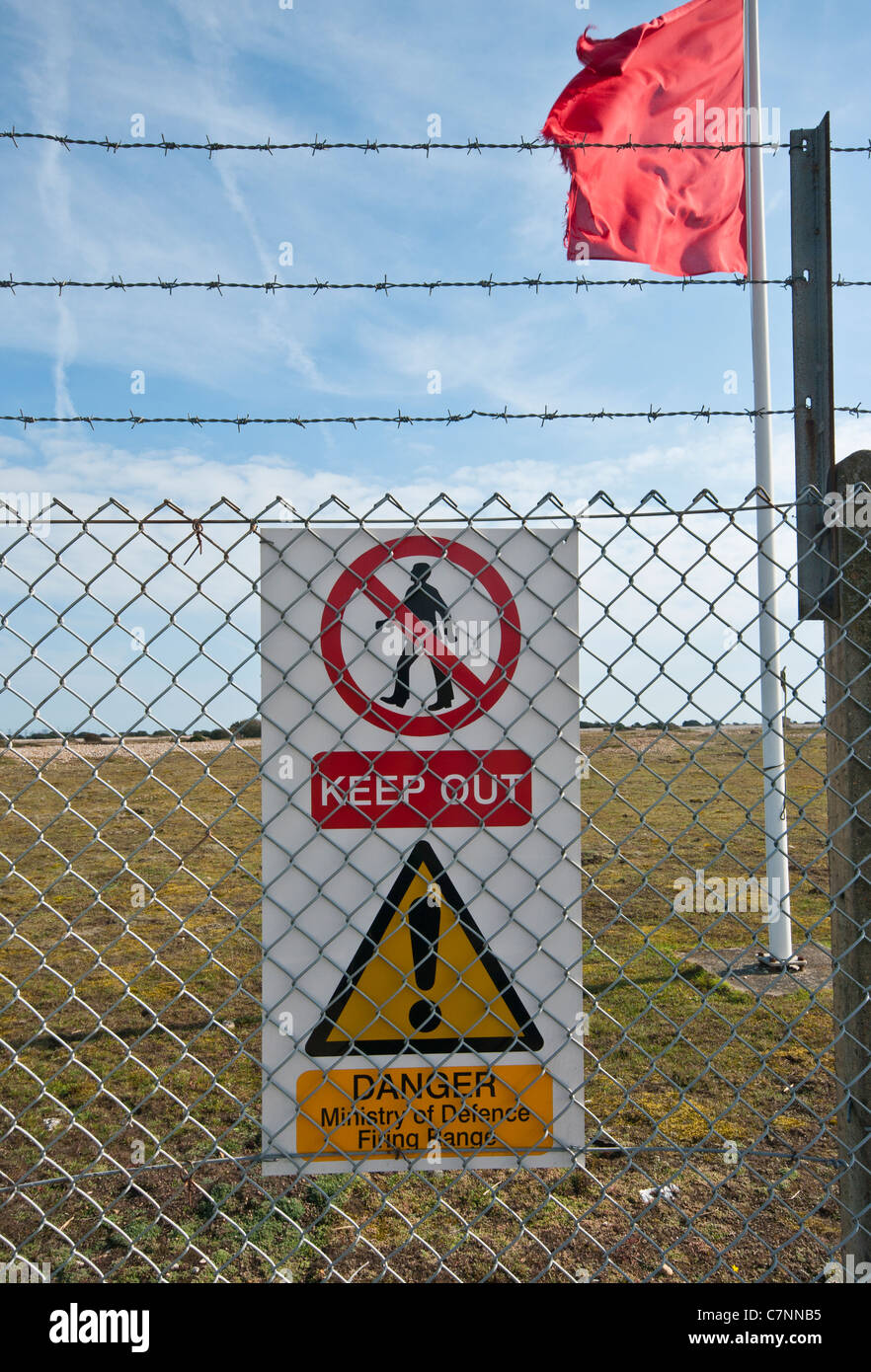 Red Live Firing Flag and Danger Sign On Perimeter Fence Of MOD British ...