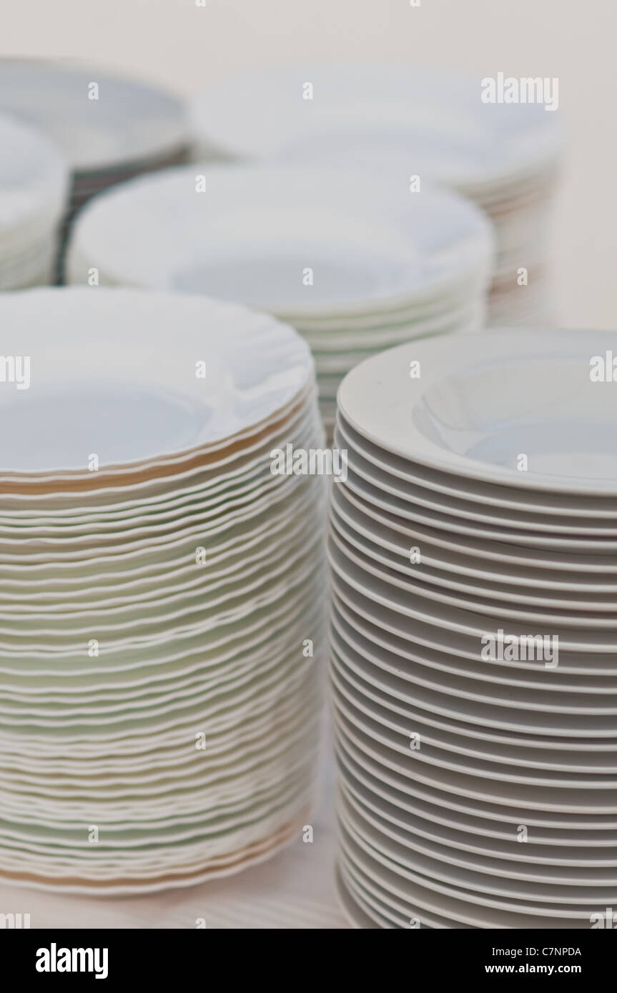 Plates in a stack shot in a studio Stock Photo - Alamy