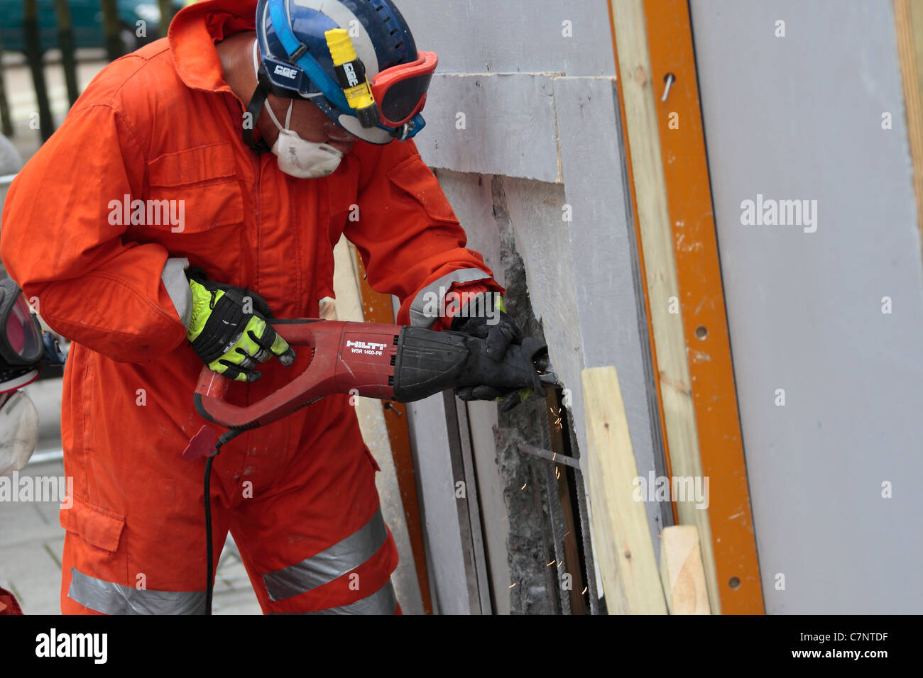 Firefighter using a Hilti saw Stock Photo - Alamy