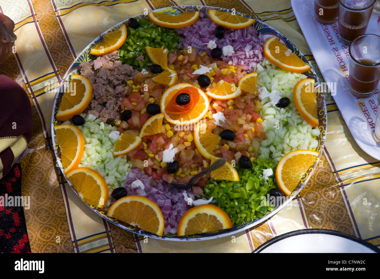Traditional Moroccan salad meal with chopped and sliced fruit ...