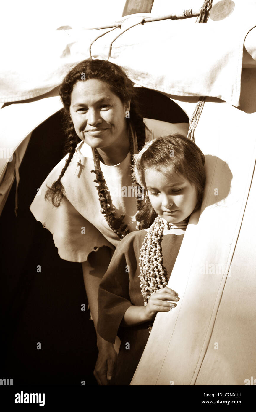 Native American Indian girl and mom in the tipi doorway Stock Photo - Alamy