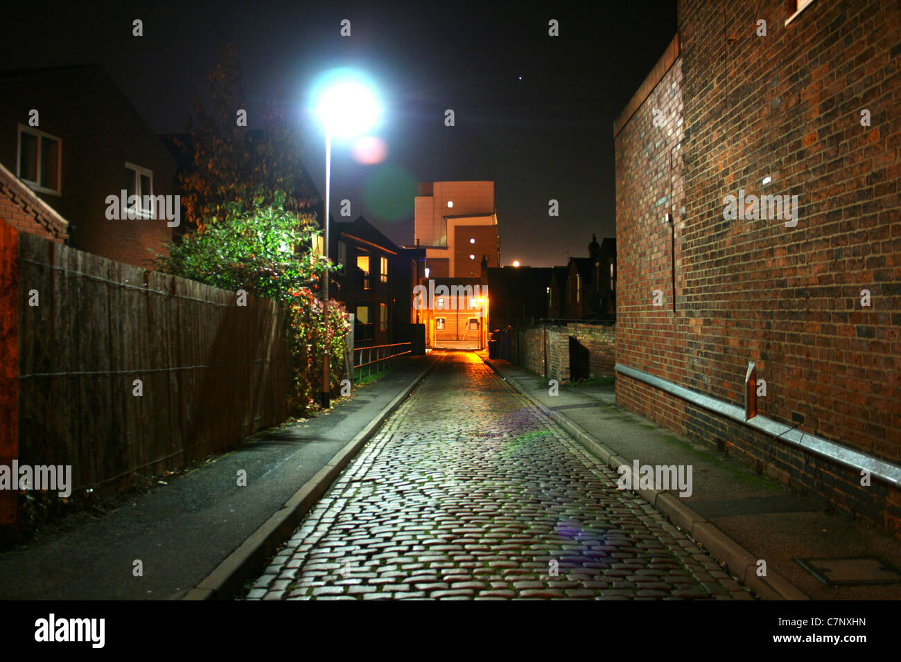 A lit street in the early morning, UK Stock Photo - Alamy