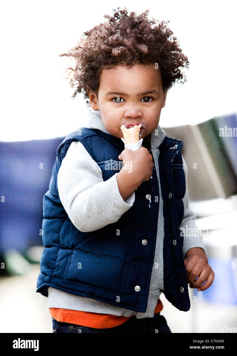 african american boy eating ice cream Stock Photo - Alamy