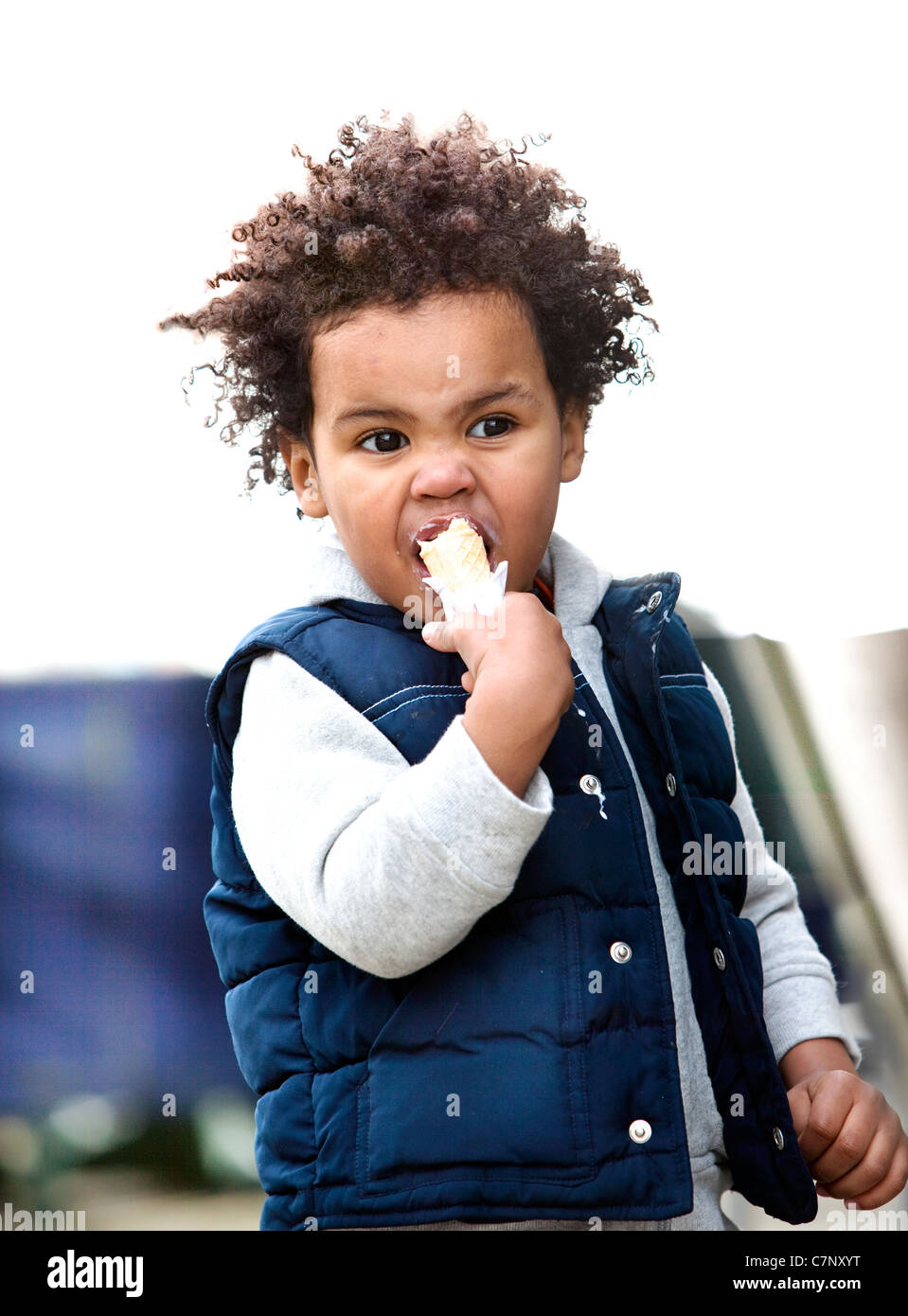 african american boy eating ice cream Stock Photo - Alamy