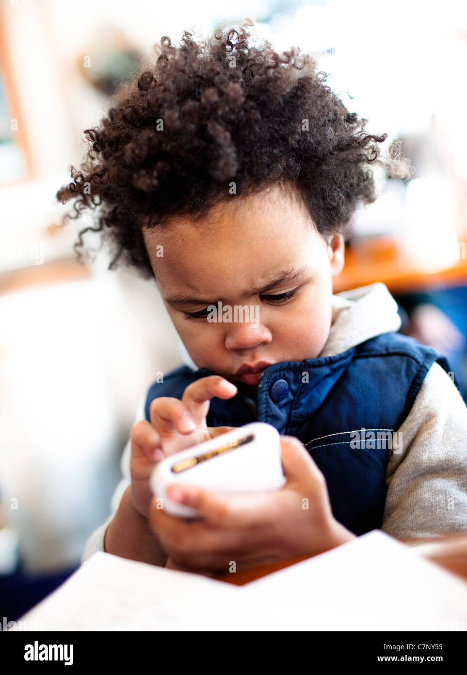 african american boy using iphone Stock Photo - Alamy