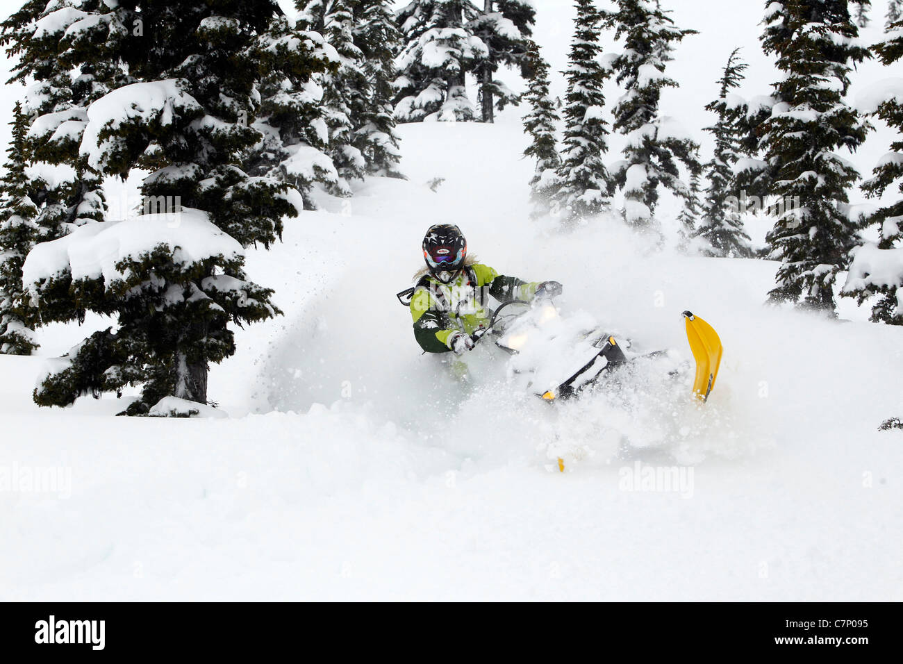 extreme snowmobile riding Stock Photo - Alamy
