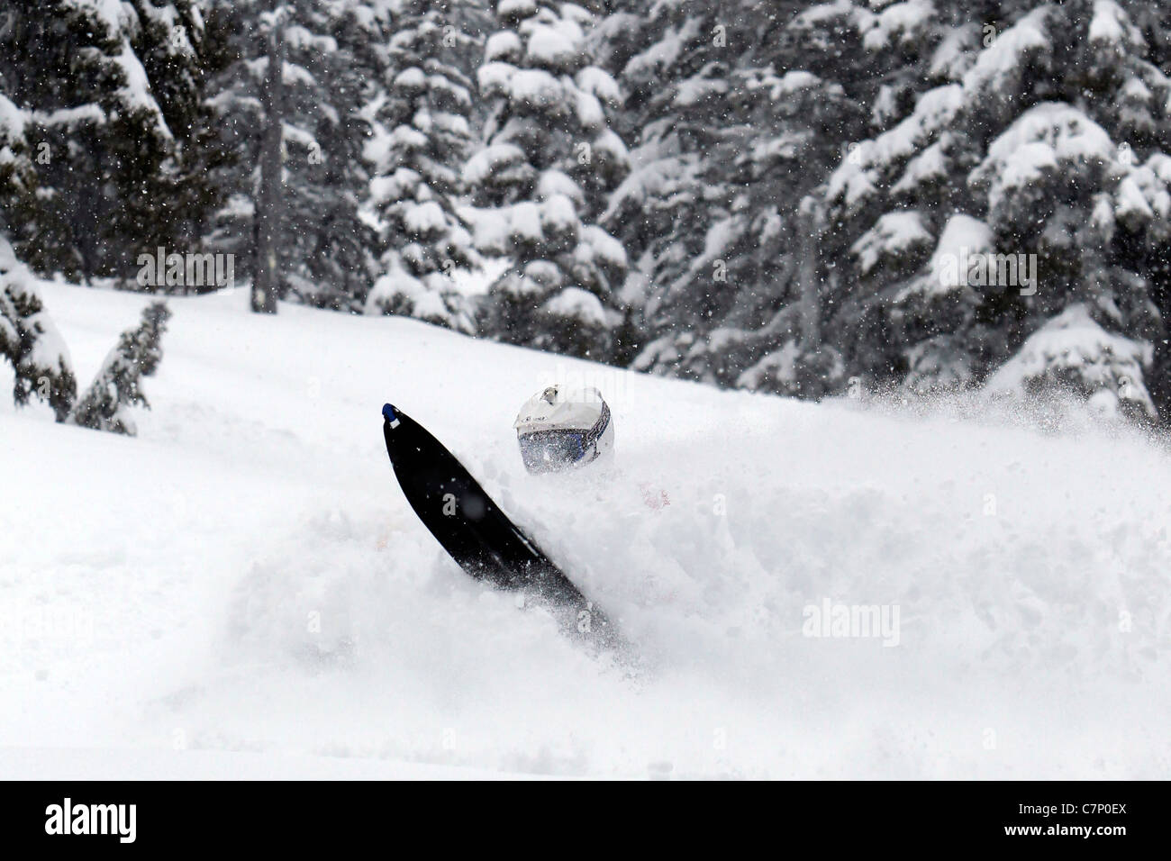 extreme snowmobile riding Stock Photo - Alamy