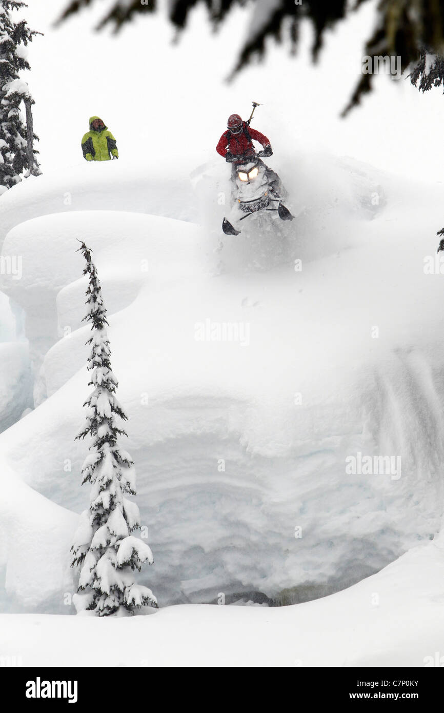 extreme snowmobile riding Stock Photo - Alamy
