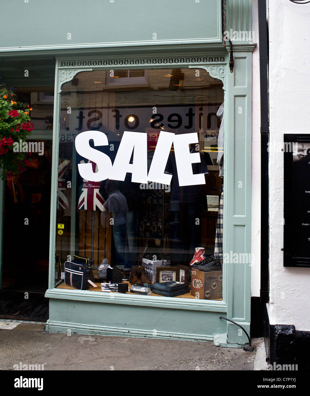 A large sale sign on a shop window Stock Photo - Alamy