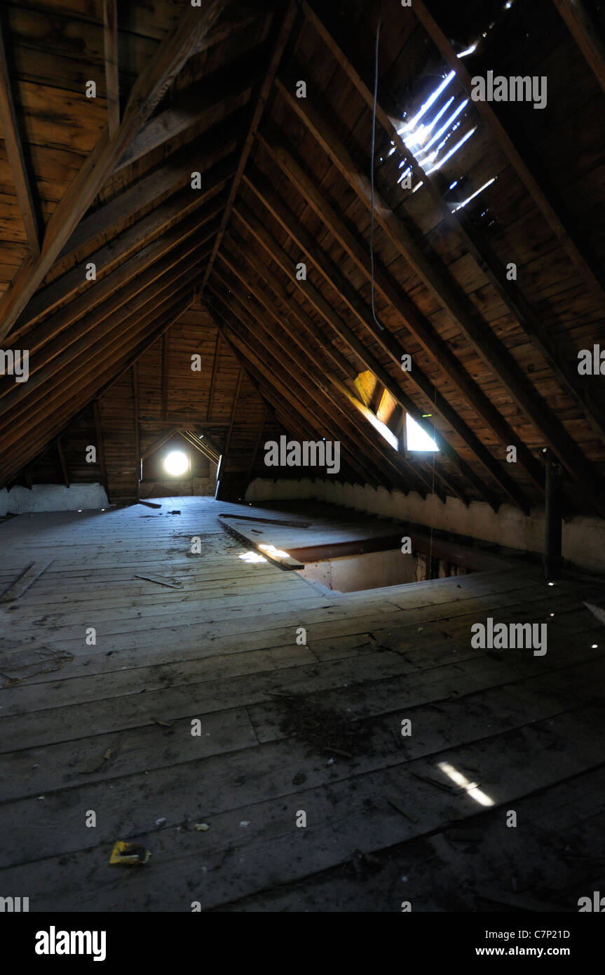 Inside of an old abandoned farm house in the middle of a field ...
