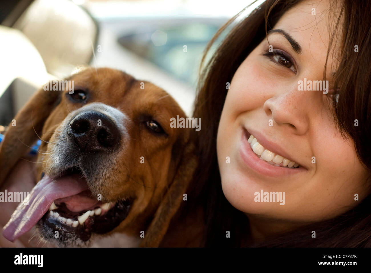 A portrait of a happy girl and her dog Stock Photo - Alamy