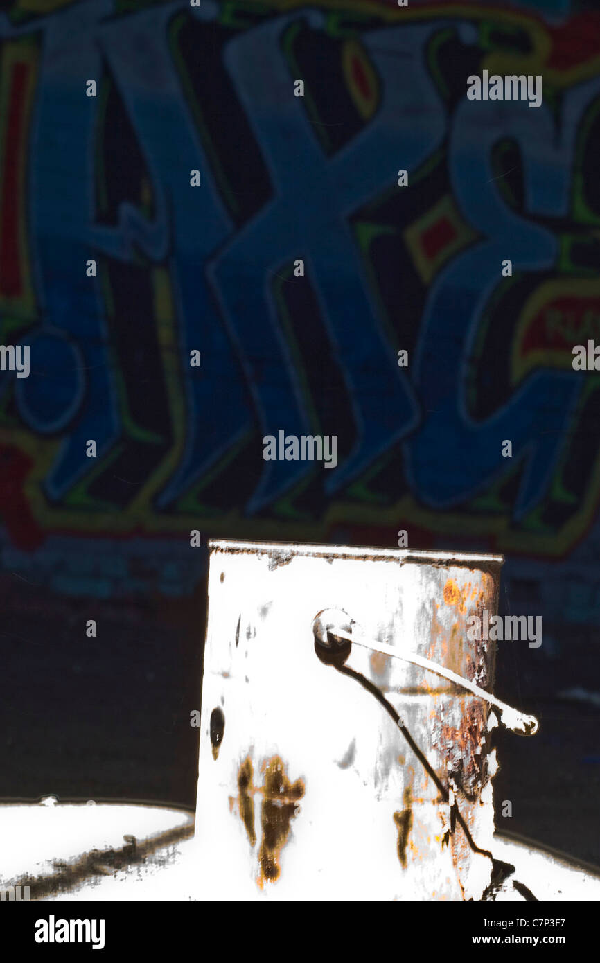 Still life shot of a rusty old paint bucket under dramatic lighting ...