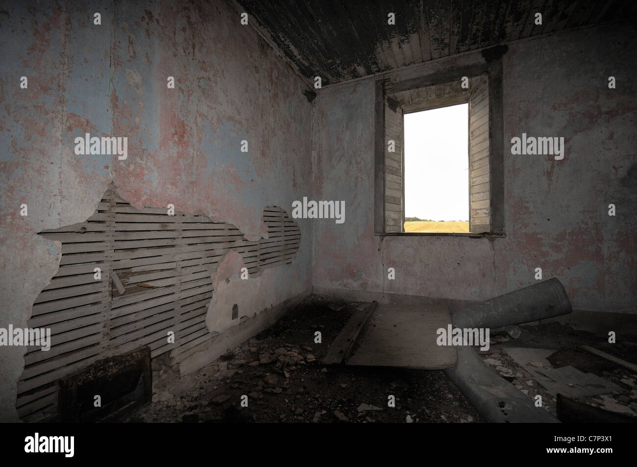 Inside of an old abandoned homestead in the middle of a field ...