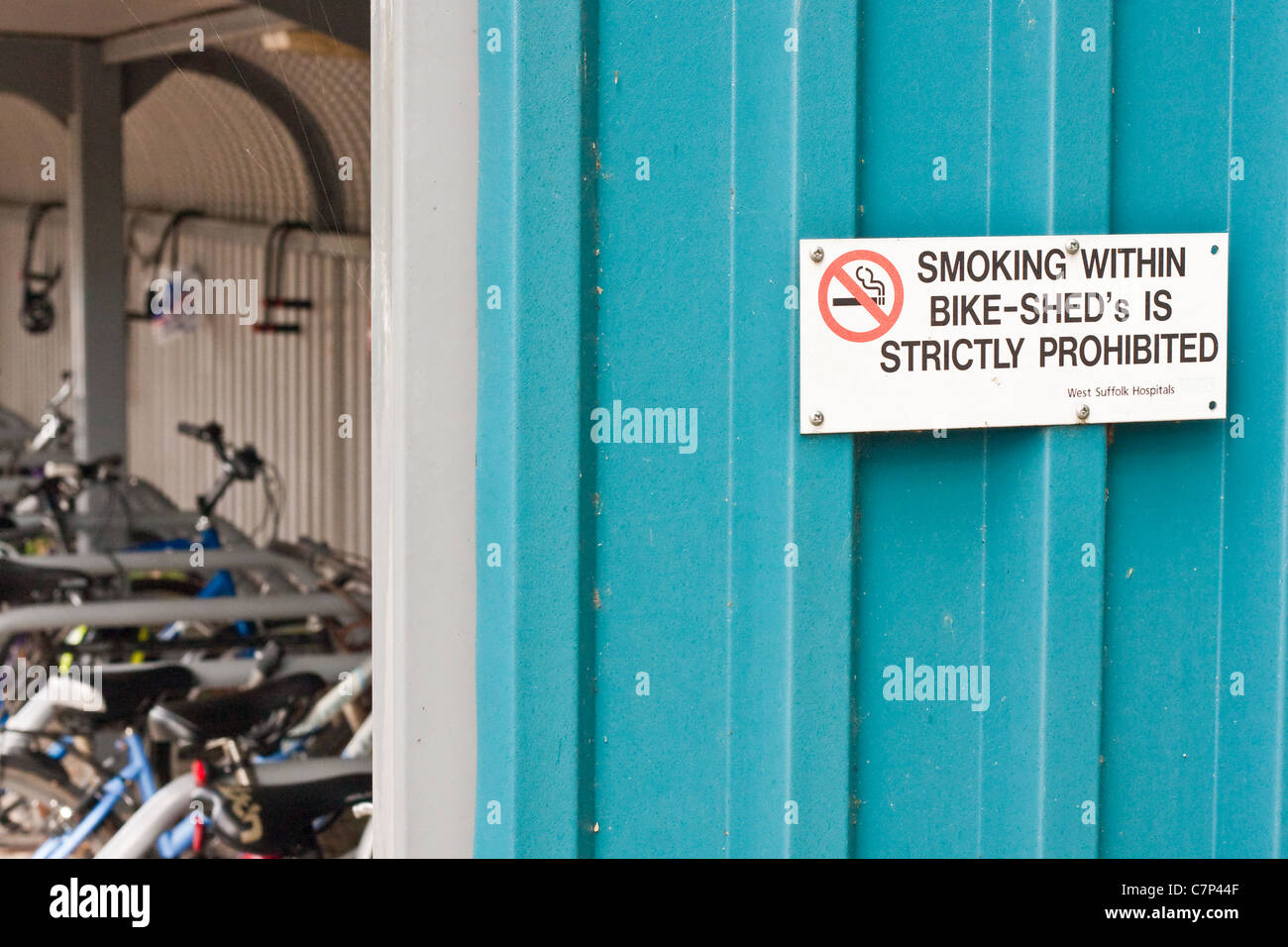 Sign prohibiting smoking in a bike shed Stock Photo - Alamy