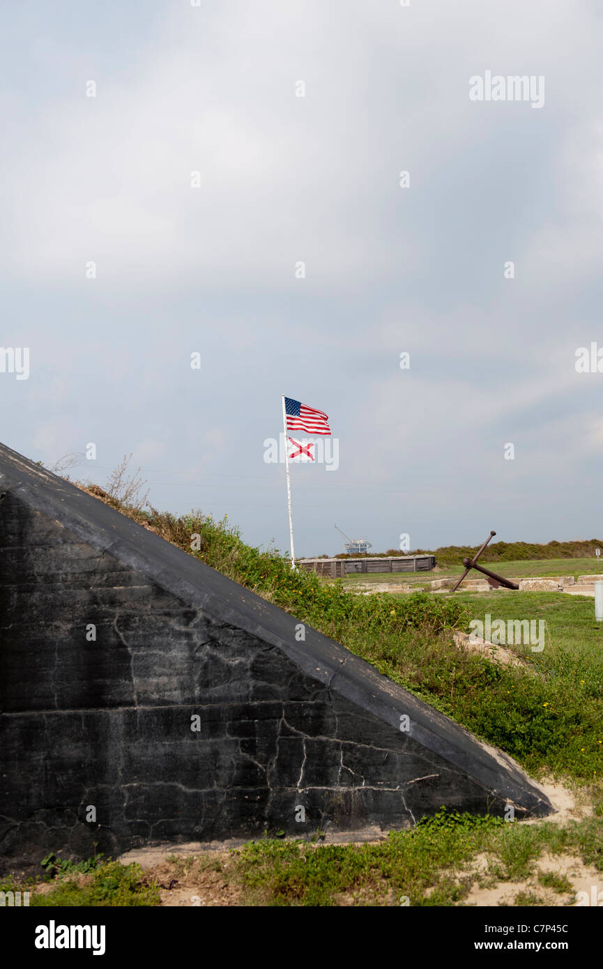 A view of the United States Flag and the Alabama State Flag flying over ...