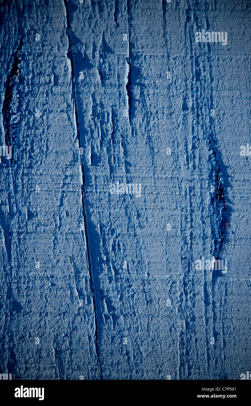 Blue flaky paint on a wood background Stock Photo - Alamy