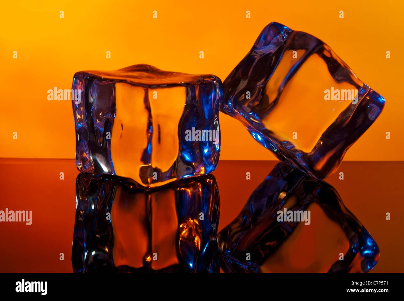 "Fire and Ice" Acrylic ice cubes and reflection Stock Photo - Alamy