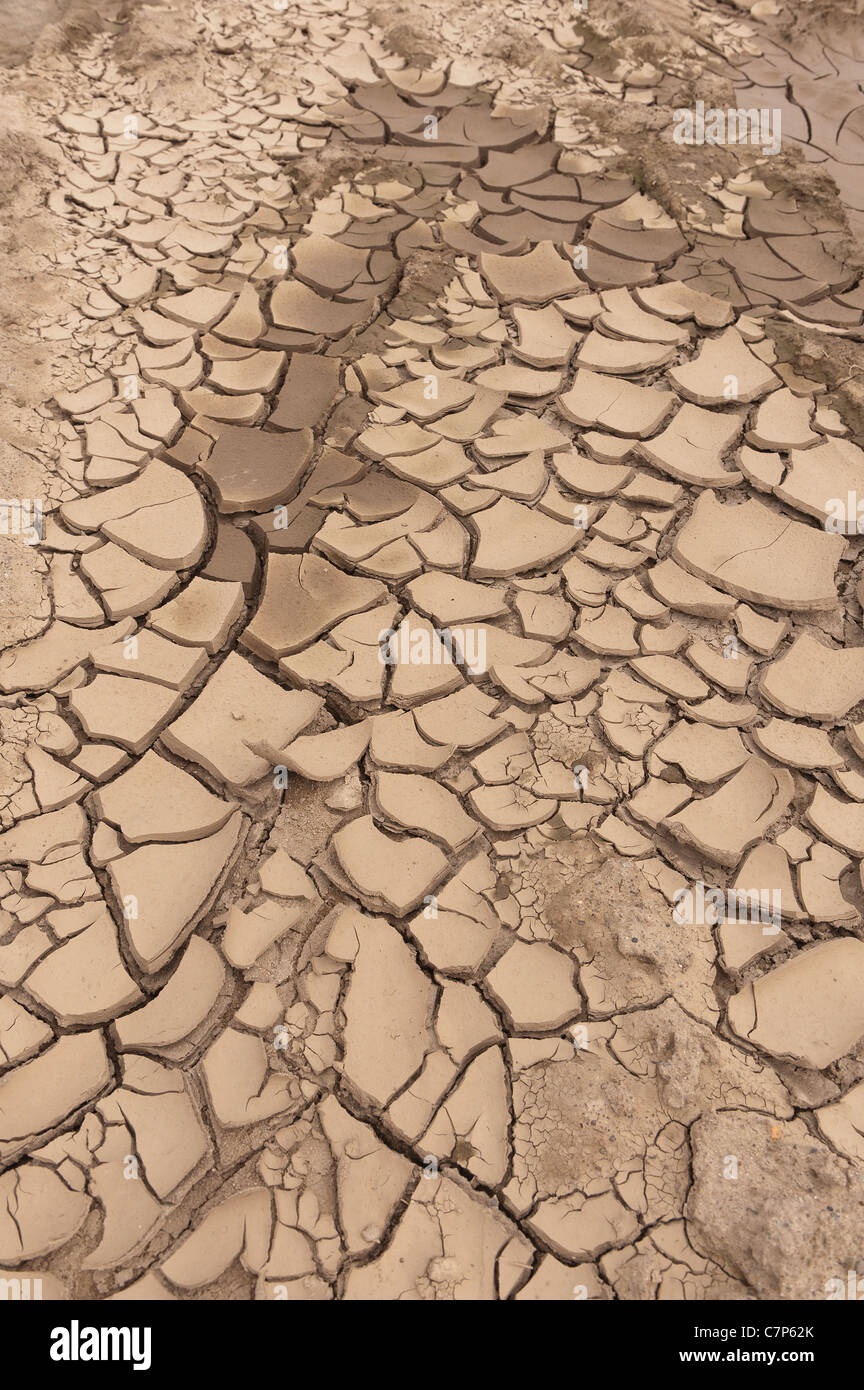 Drought dried mud soil creating difficult structure for crops to grow ...