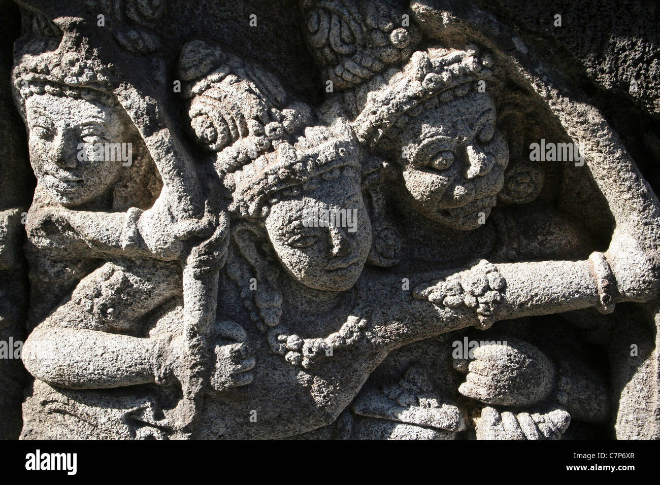 Stone Carved Temple Relief At Prambanan Temple, Indonesia Stock Photo ...