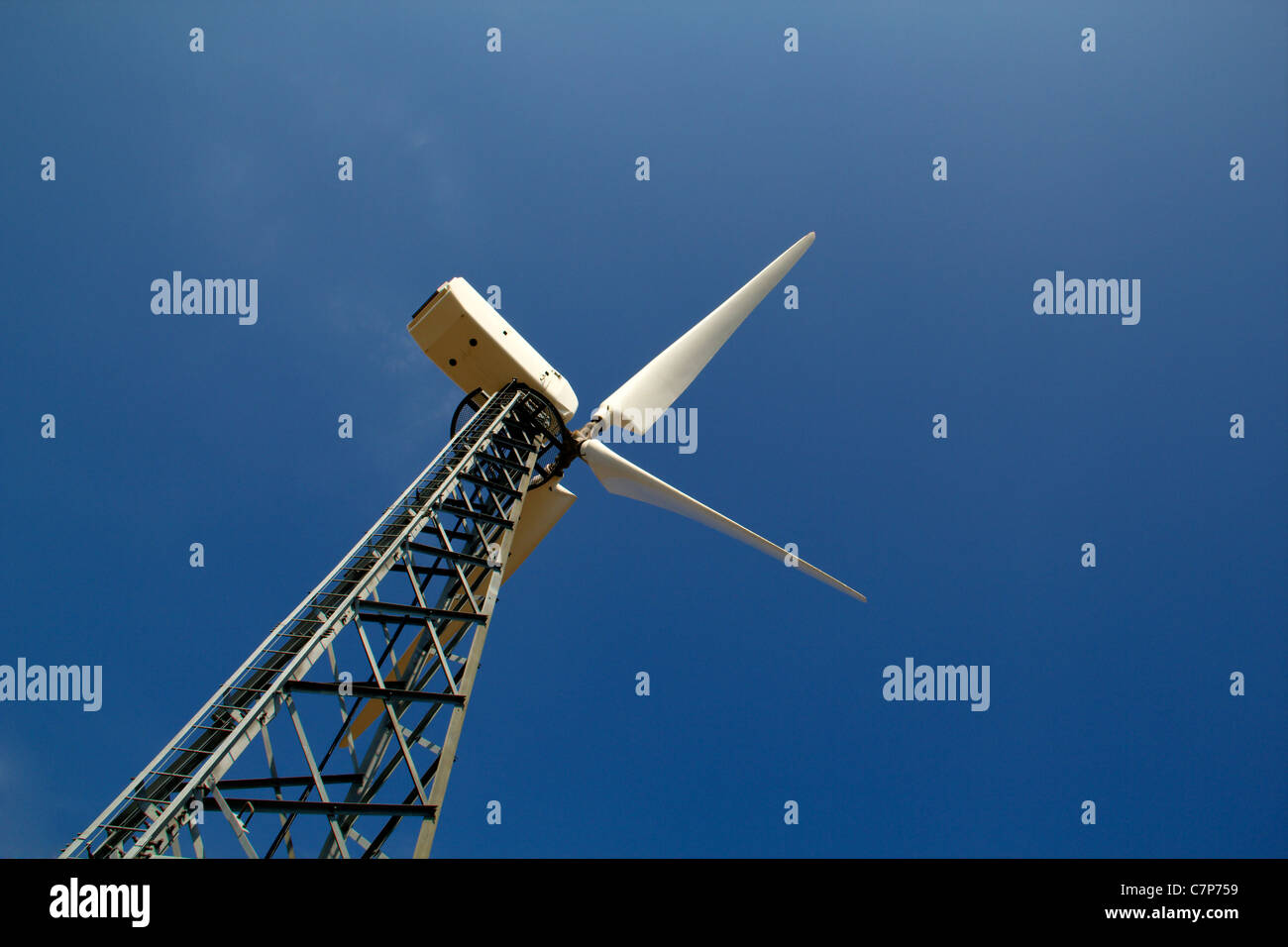 The wind generator against the blue sky Stock Photo - Alamy