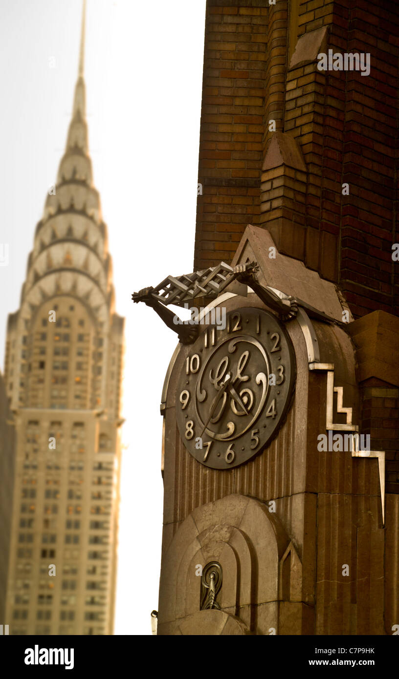 Clock on General Electric Building with Chrysler Building in background ...