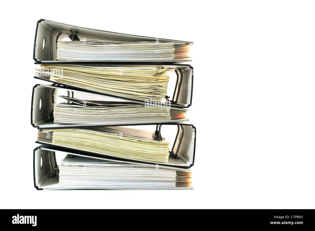 Various black colored office binders with important documents on white ...