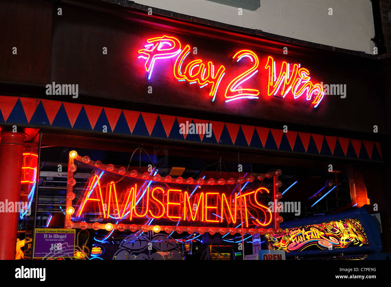 'Amusements' arcade neon sign at night Stock Photo - Alamy