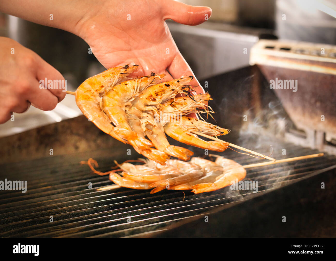 Group Of Men Cooking High Resolution Stock Photography and Images - Alamy