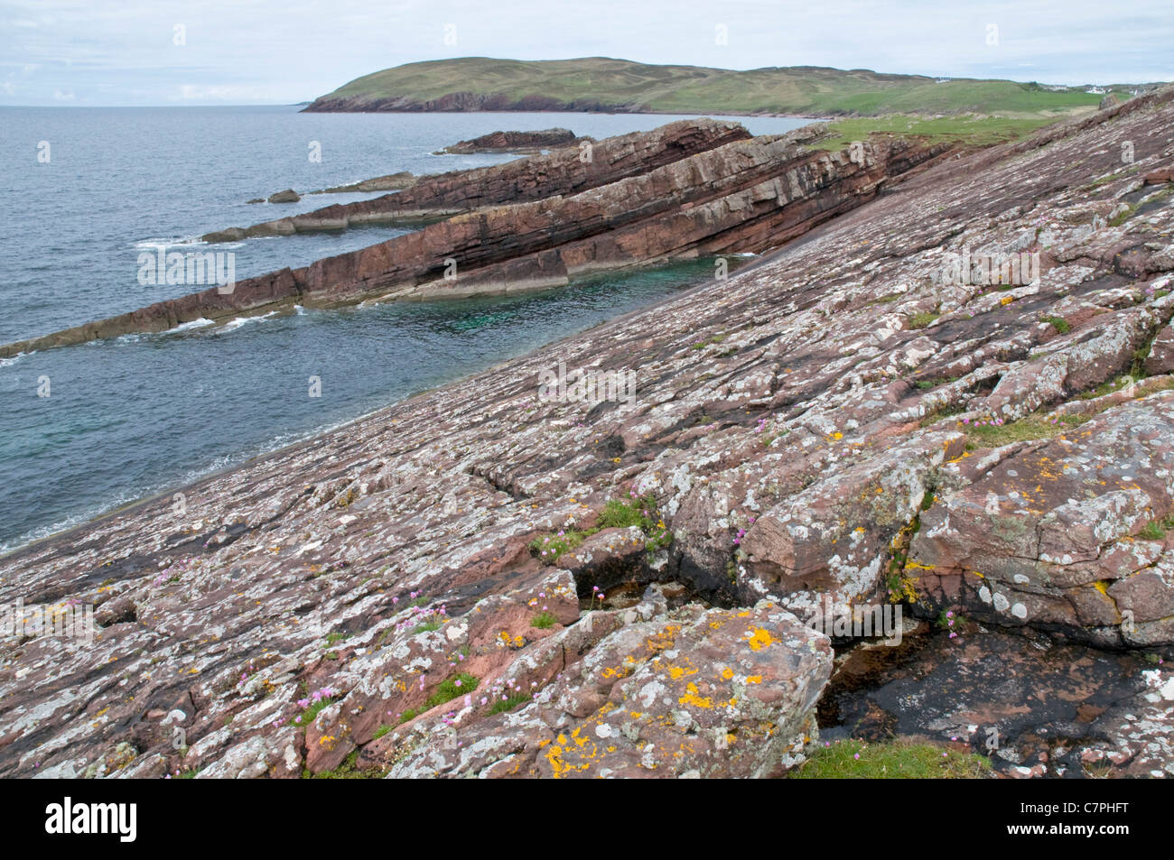 Impressive rock formations on Scotland's north west coast between ...
