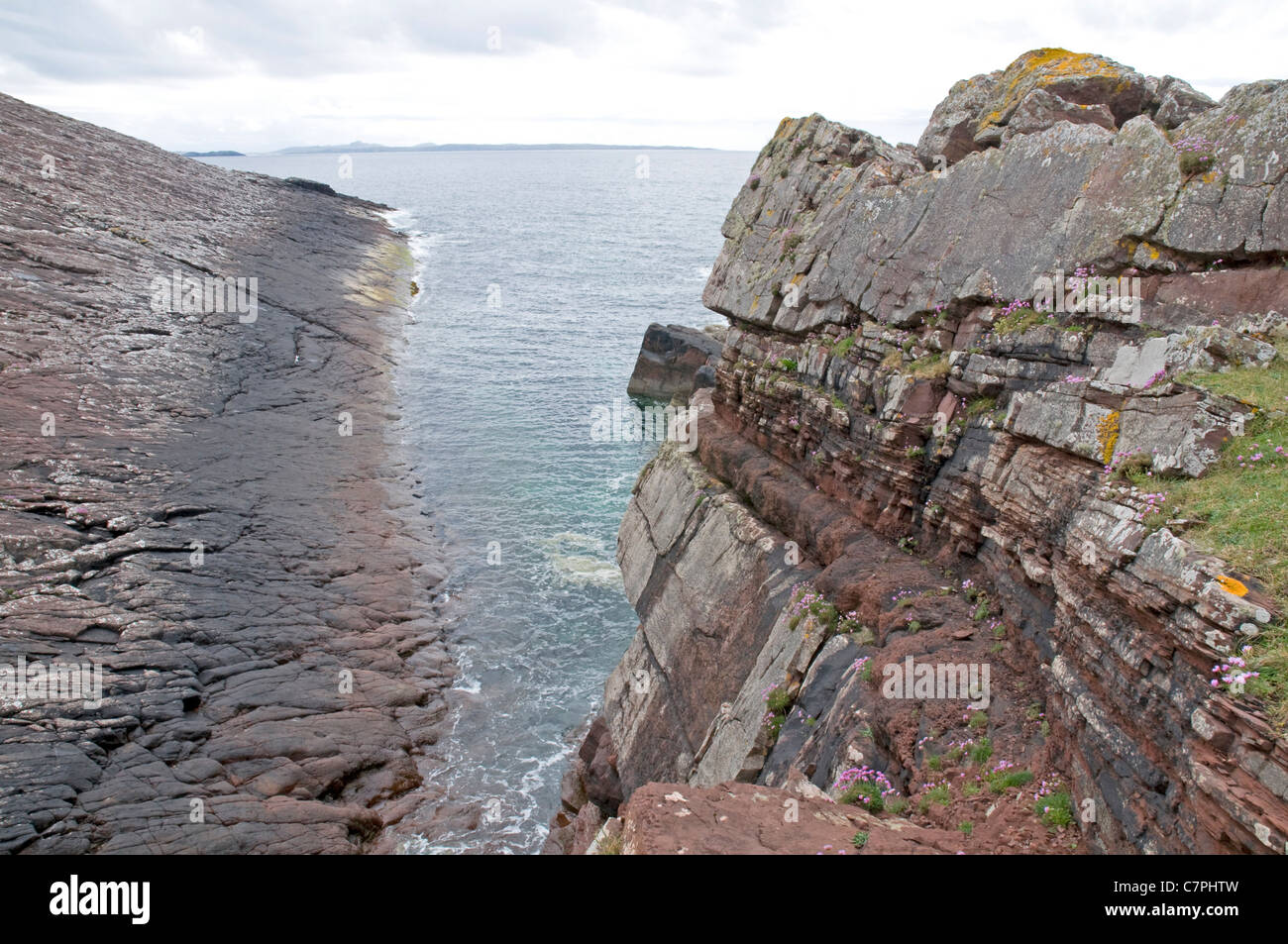 Impressive rock formations on Scotland's north west coast between ...