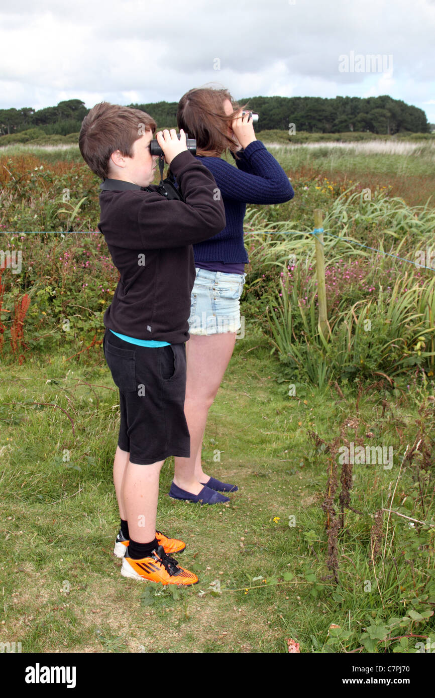 Family birdwatching; Marazion; Cornwall; UK Stock Photo - Alamy