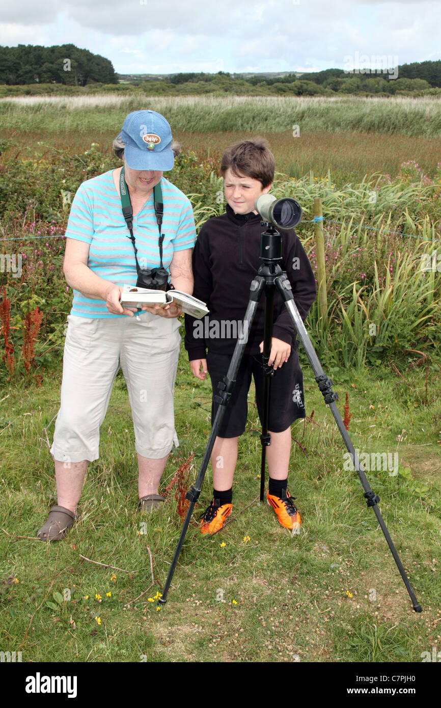 Family birdwatching; Marazion; Cornwall; UK Stock Photo - Alamy
