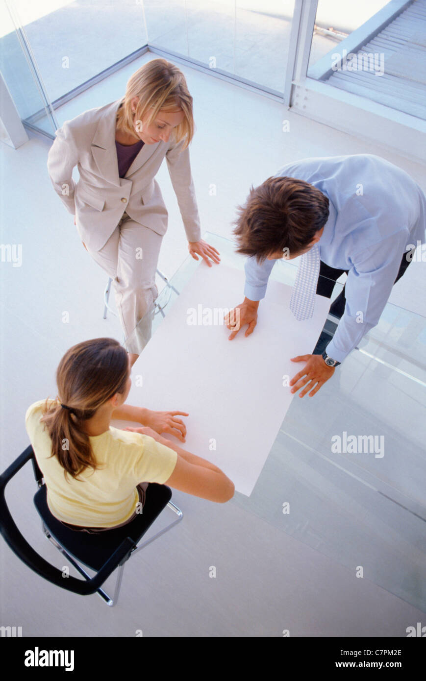 Business people examining plans Stock Photo - Alamy