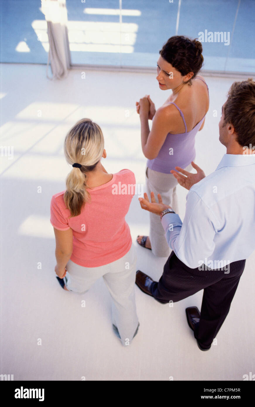 Businesspeople walking together Stock Photo - Alamy