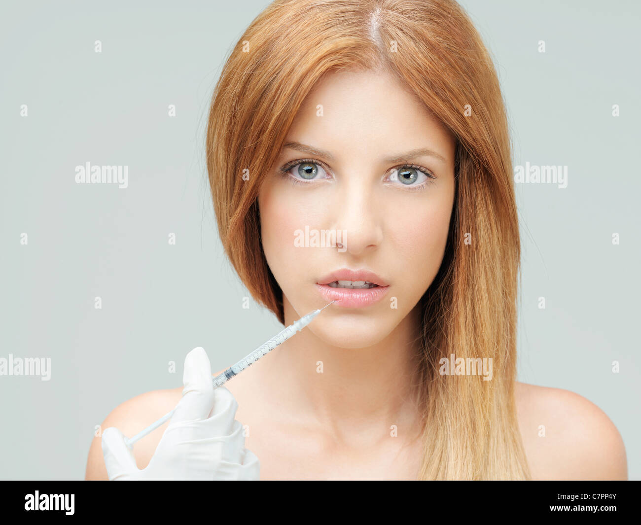Female patient having botox injection hi-res stock photography and ...