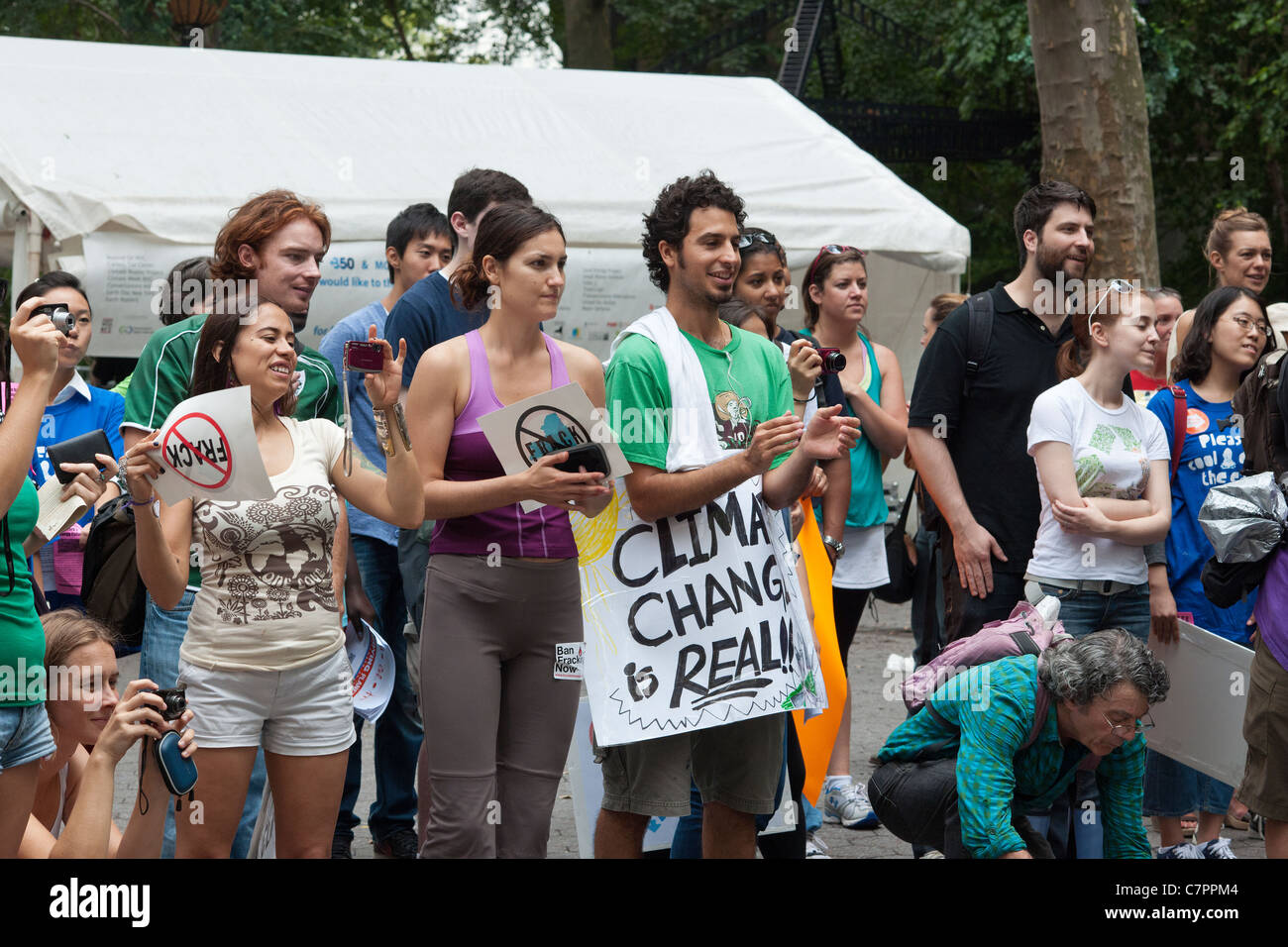Environmental activists rally in Dag Hammarskjold Plaza in New York ...