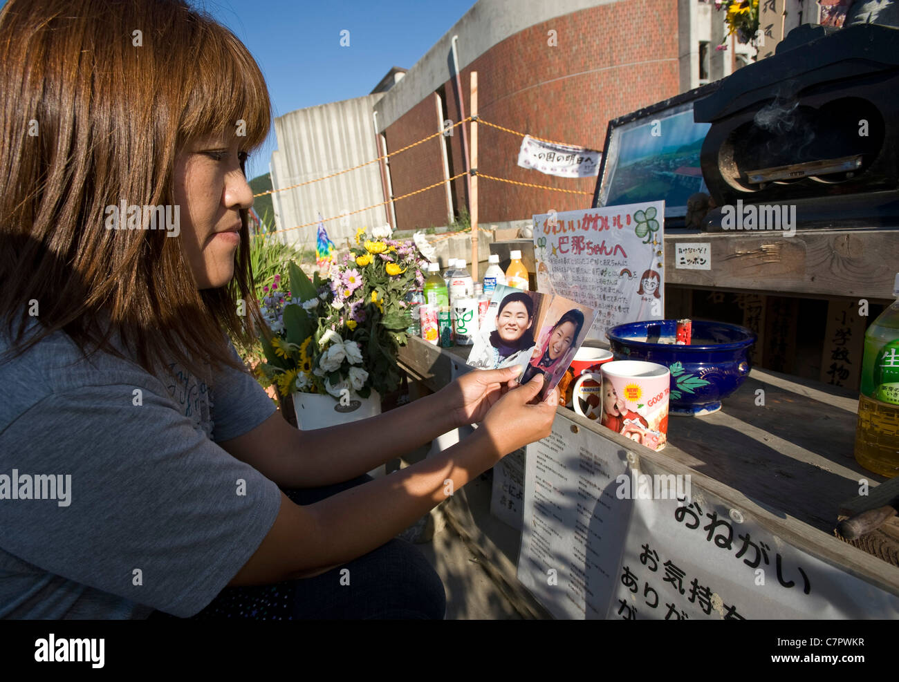 Miho Suzuki, 43, whose daughter Kana was swept away during the tsunami ...
