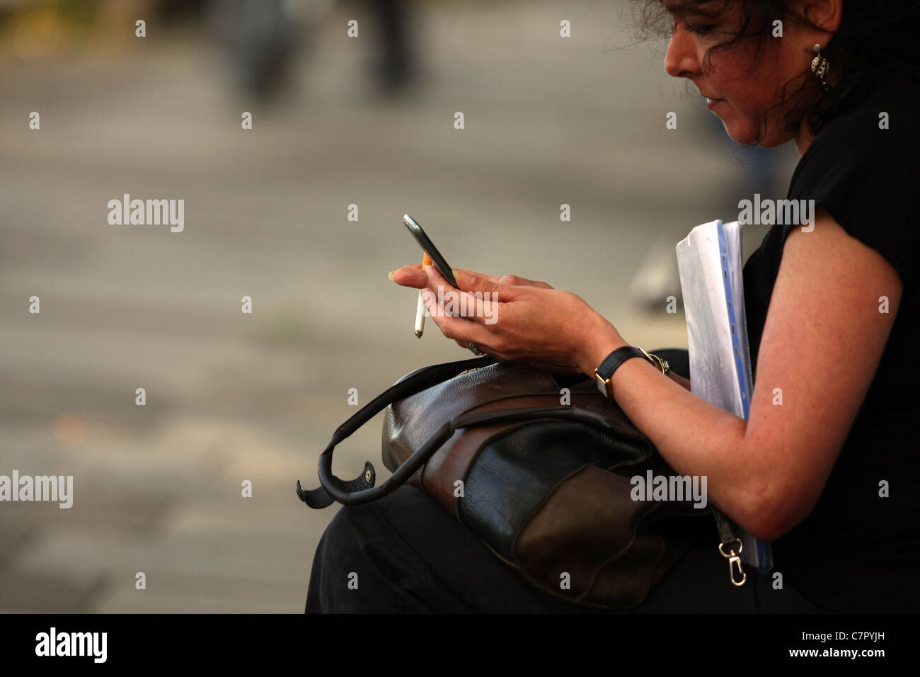 Hand lighted cigarette smoke hi-res stock photography and images - Alamy