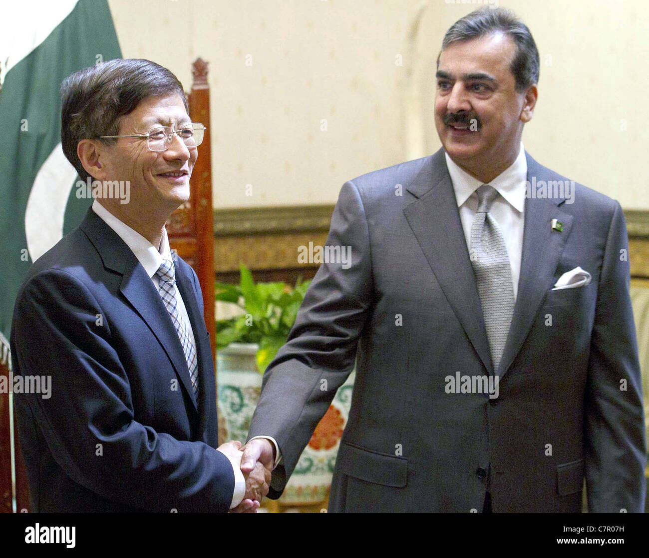 Syed Yousuf Raza Gilani shakes hand with Meng Jianzhu State Councilor ...