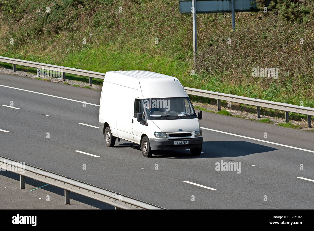 White Van on a road or motorway Stock Photo - Alamy